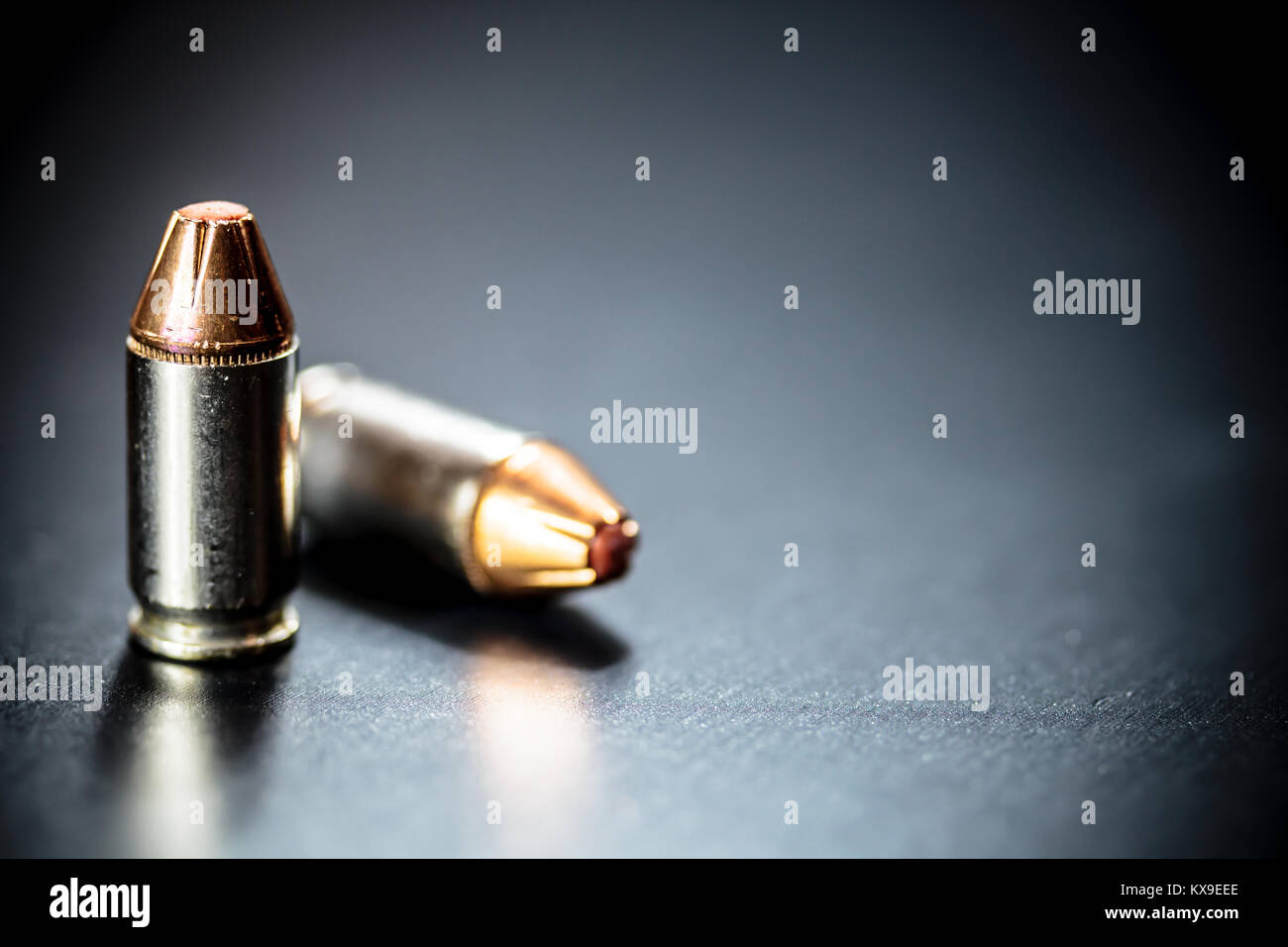 A hand gun pistol bullets Stock Photo - Alamy