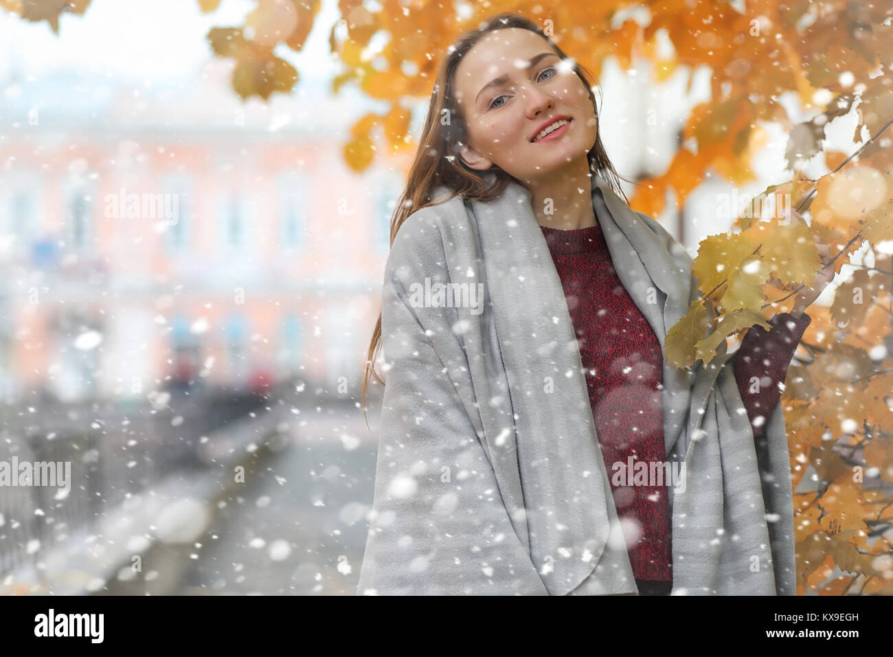 A girl in the park in the first snowfall Stock Photo - Alamy