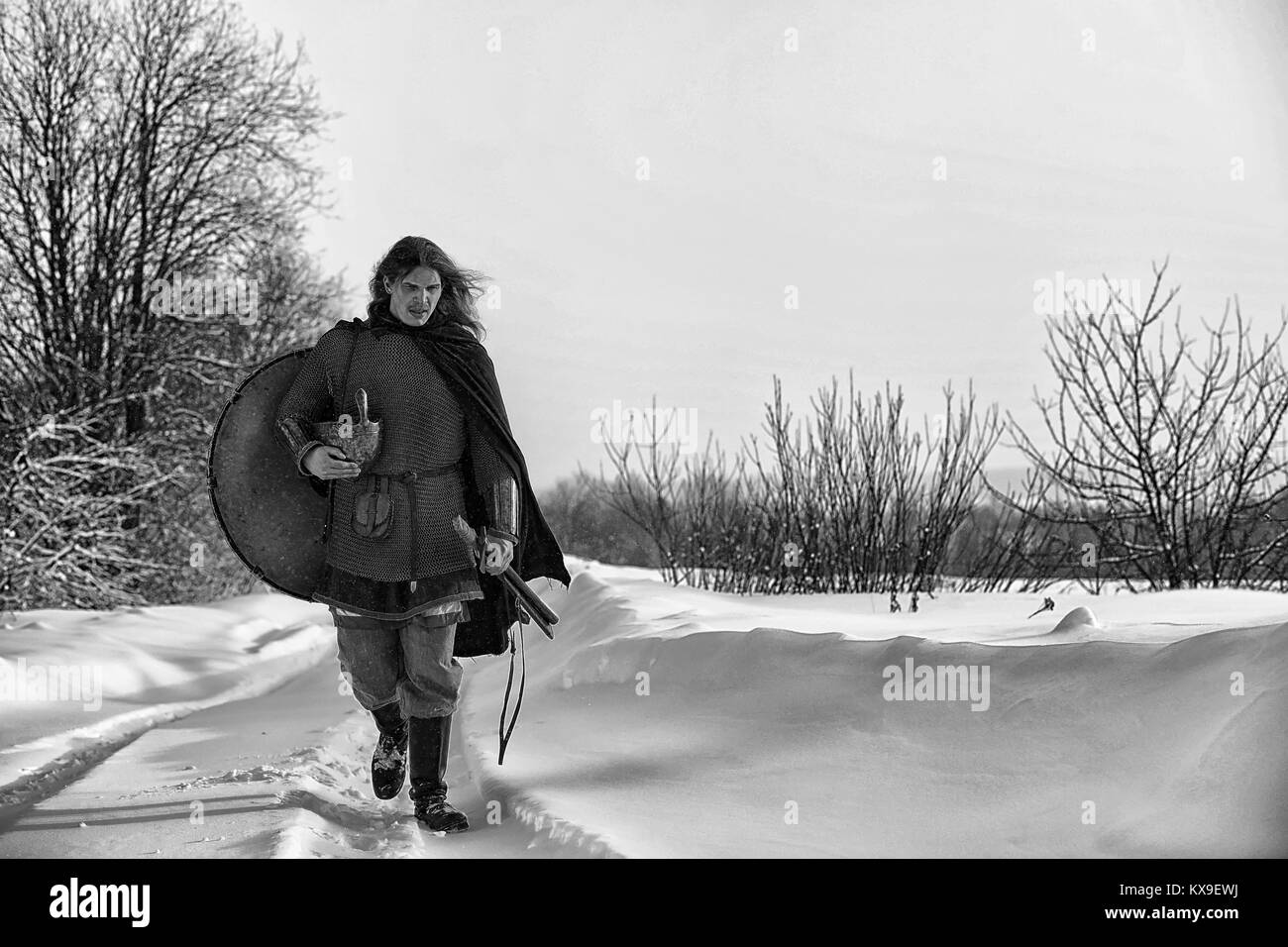 Defender the young warrior in armor Stock Photo - Alamy