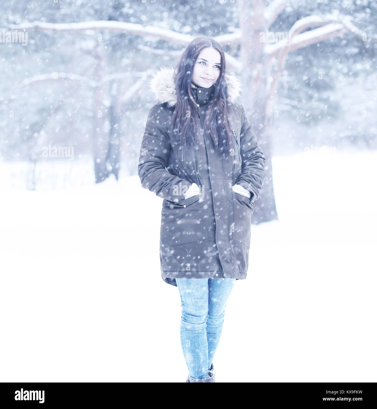 Beautiful girl in a beautiful winter snow Stock Photo - Alamy