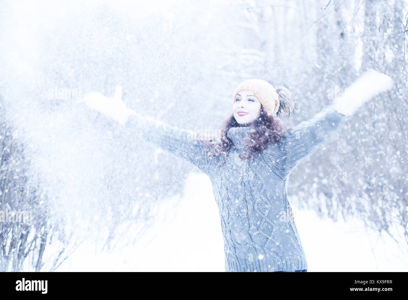 Beautiful girl in a beautiful winter snow Stock Photo - Alamy