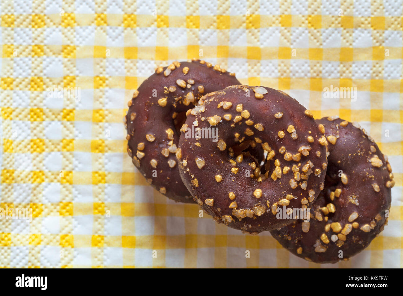 Mini Ring Doughnuts With A Chocolate And Orange Flavour Topping High ...