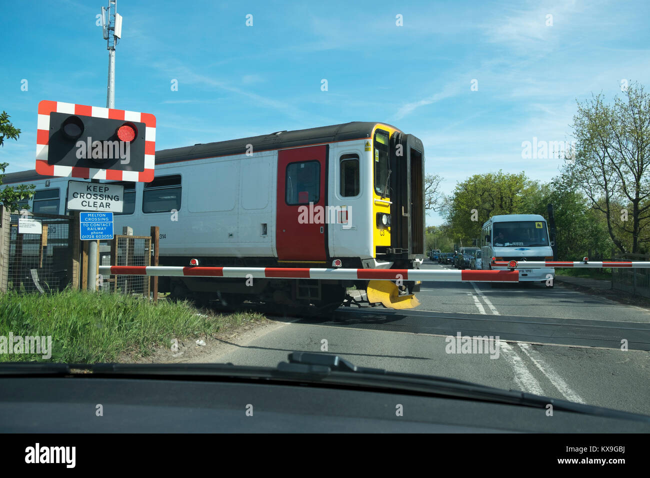 Railway level crossing Stock Photo - Alamy