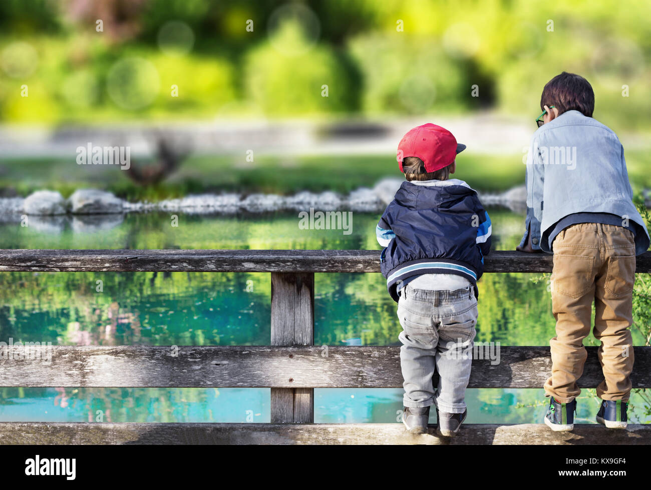 Boys on the bridge Stock Photo - Alamy
