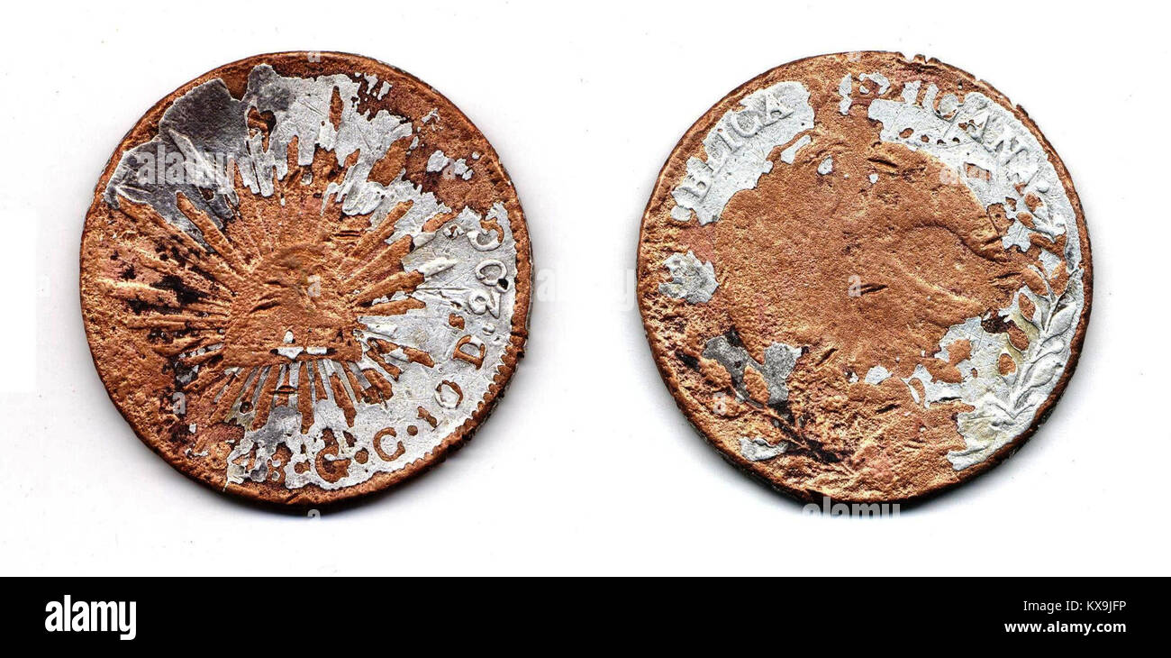 A 1848 counterfeit 8 reales coin from Mexico, displaying both obverse ...