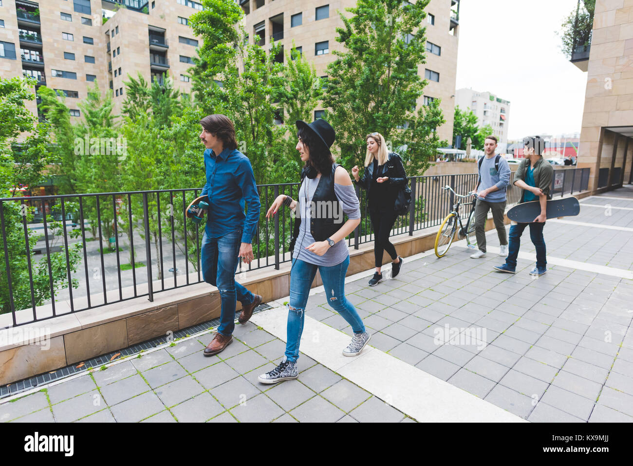group of friends multiethnic walking outdoor having fun - friendship ...