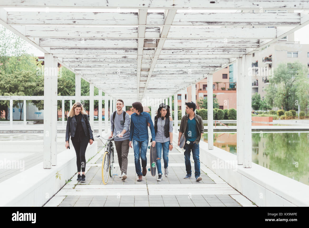 group of friends multiethnic walking outdoor having fun - friendship ...