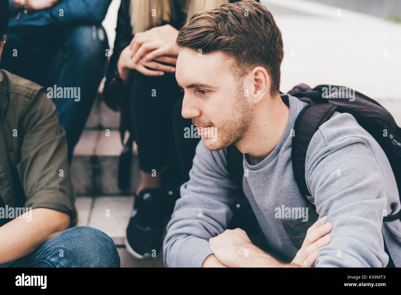 portrait young man looking away smiling - positive emotions, getting ...