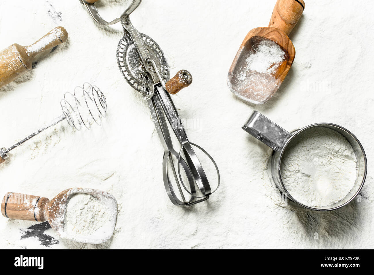 Various baking tools on flour. Top view Stock Photo - Alamy