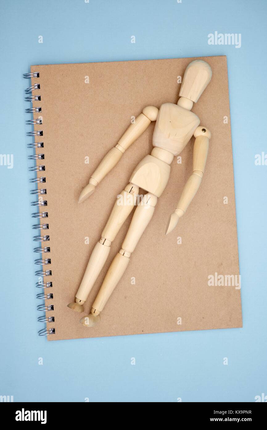 A studio photo of a wooden toy mannequin Stock Photo - Alamy
