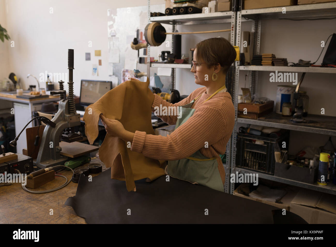 Leather worker woman hi-res stock photography and images - Alamy