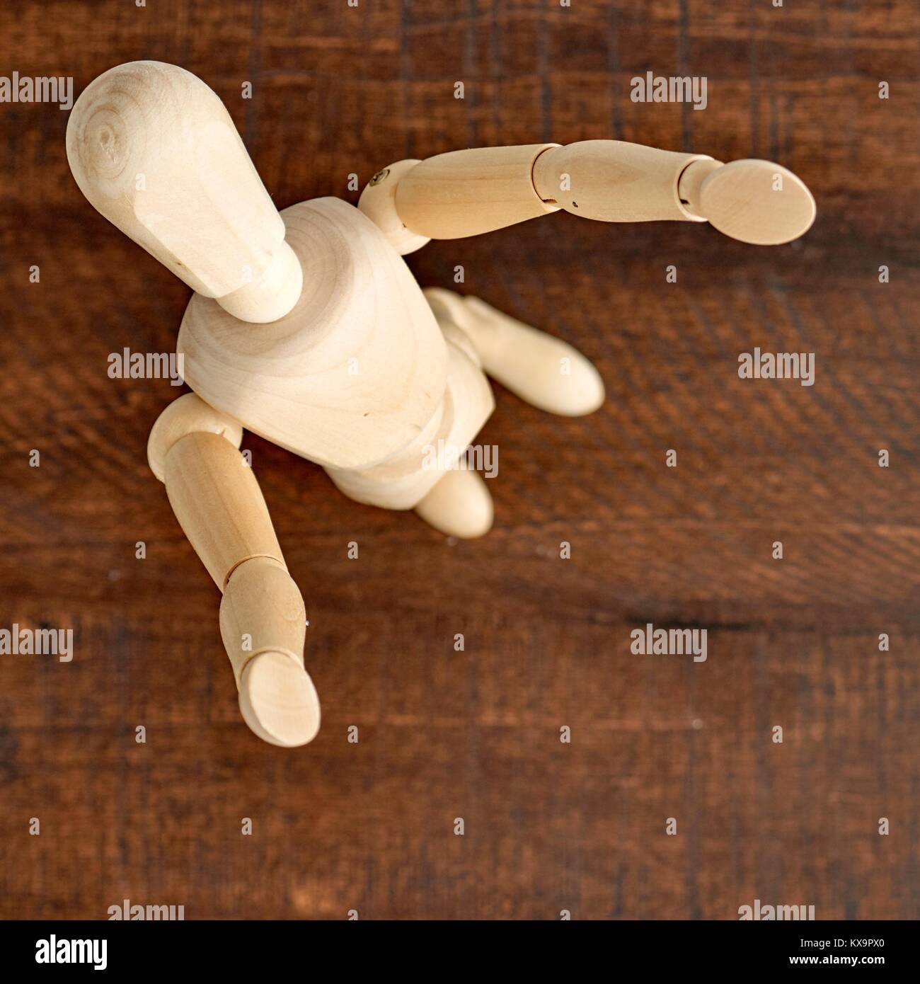 A studio photo of a wooden toy mannequin Stock Photo - Alamy