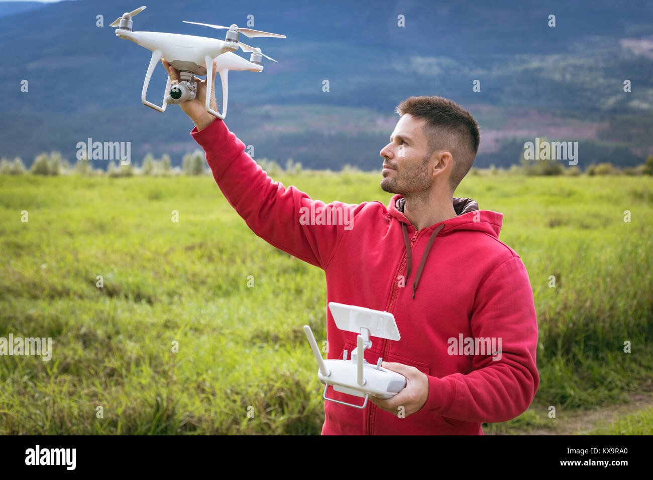 Man holding remote control drone hi-res stock photography and images ...