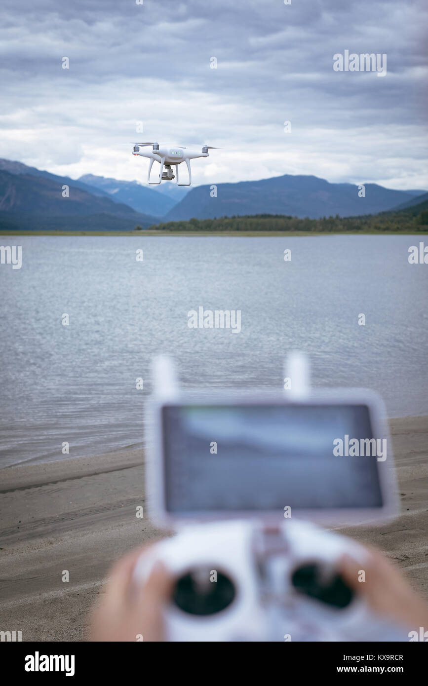 Drone operating using a remote control Stock Photo - Alamy