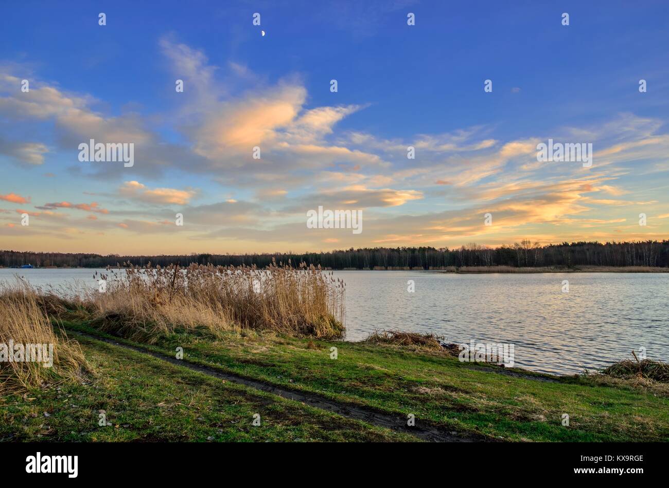 Beautiful water landscape. Lakeside and beautiful blue afternoon sky ...