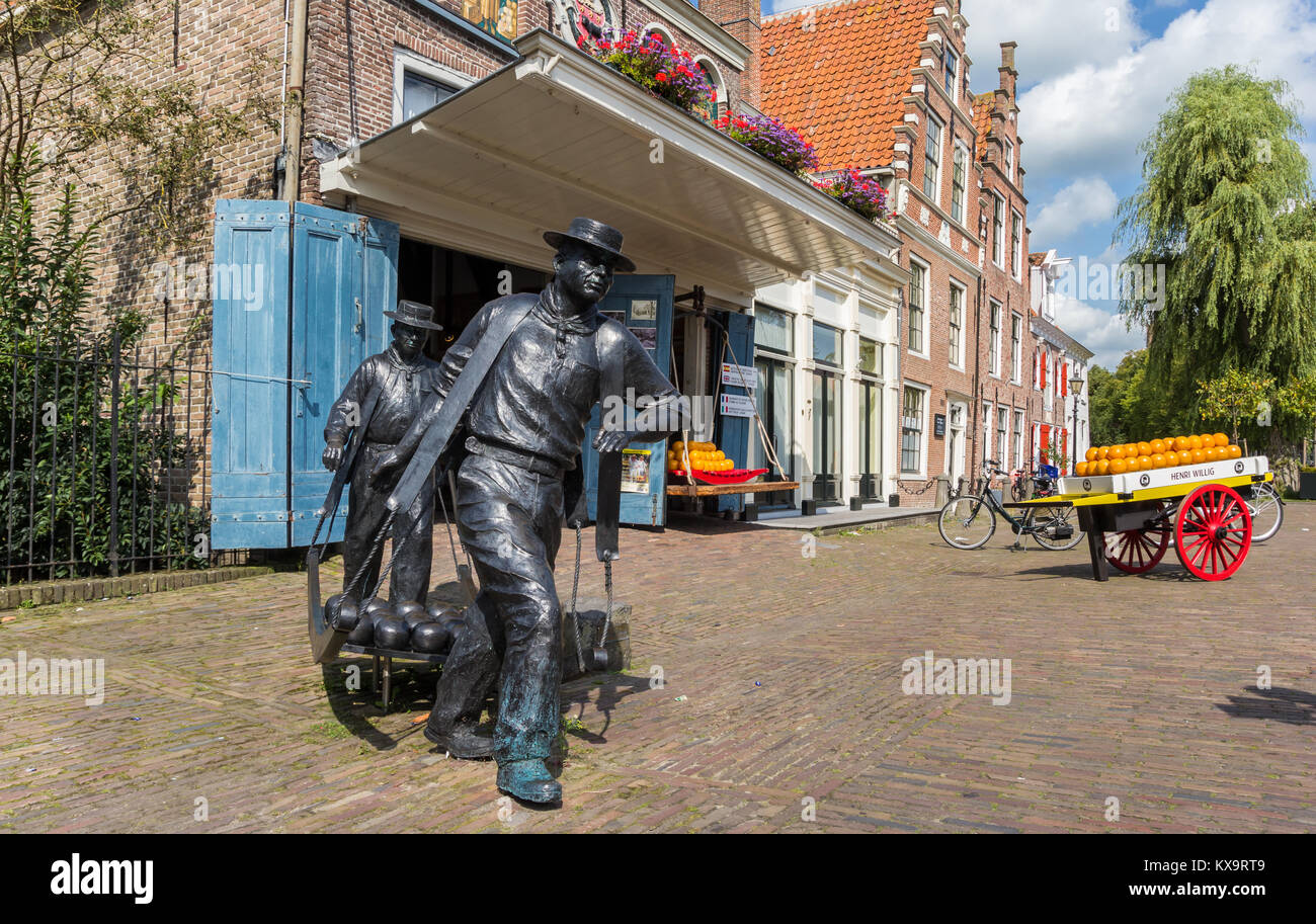 Statue of cheese carriers at the cheese market in Edam, Netherlands ...