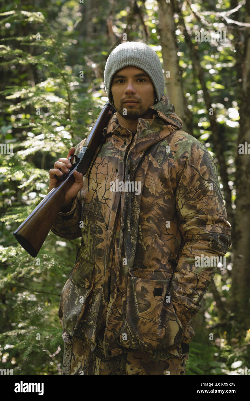 Hunter Standing In Forest High Resolution Stock Photography and Images ...