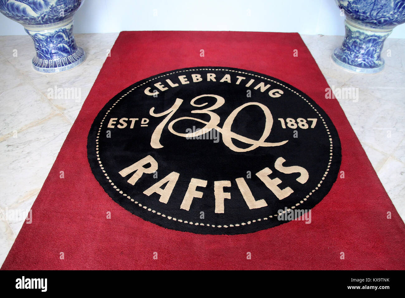 130 year celebration carpet at Raffles Hotel Stock Photo - Alamy
