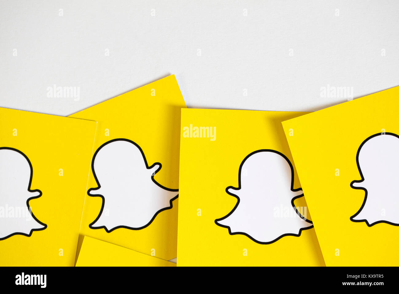 OXFORD, UK - DECEMBER 5th 2016: Snapchat logos printed onto paper ...