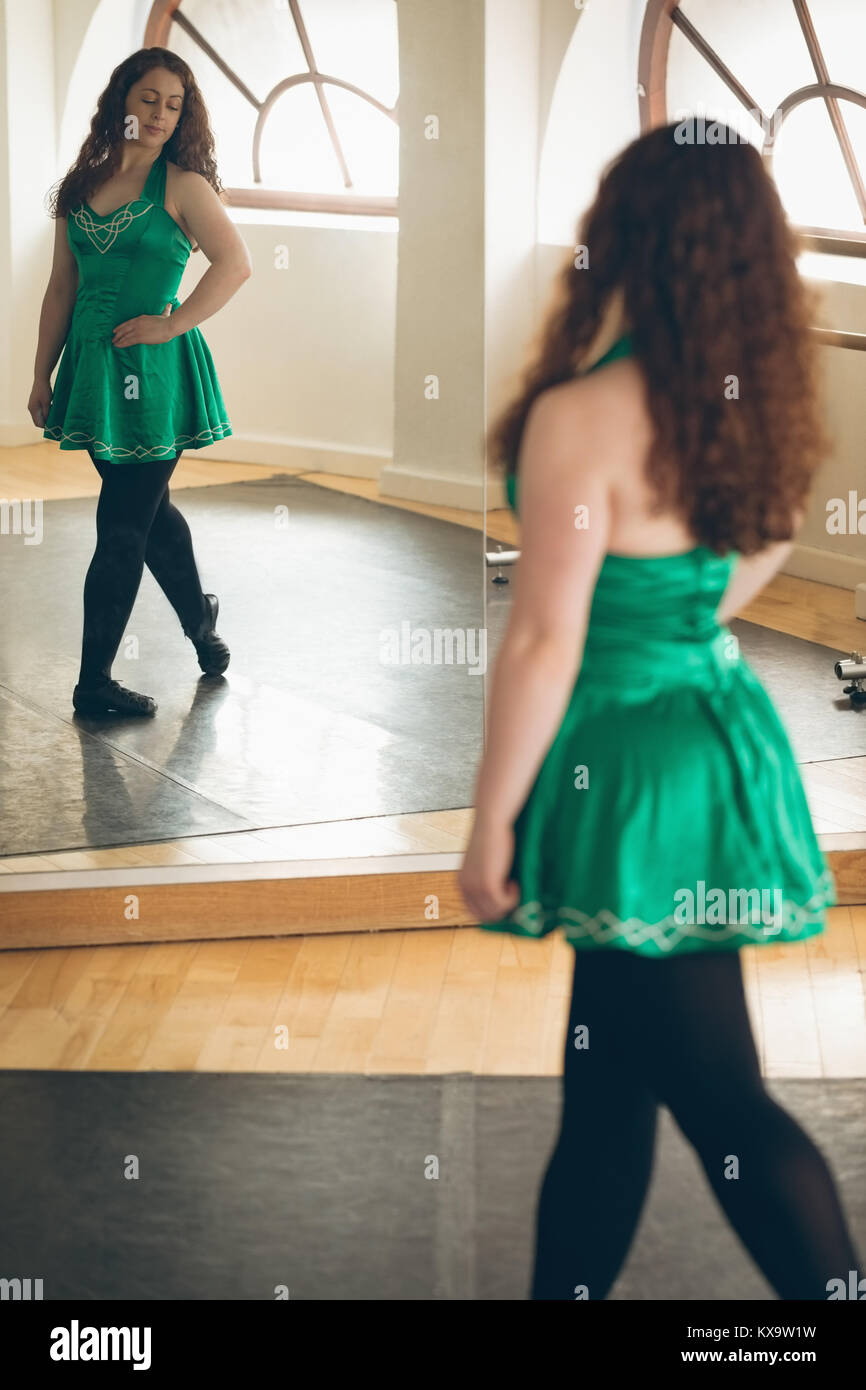 Irish dancer practicing in front of the mirror Stock Photo - Alamy