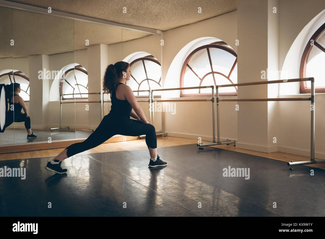 Irish dancer performing stretching exercises Stock Photo - Alamy