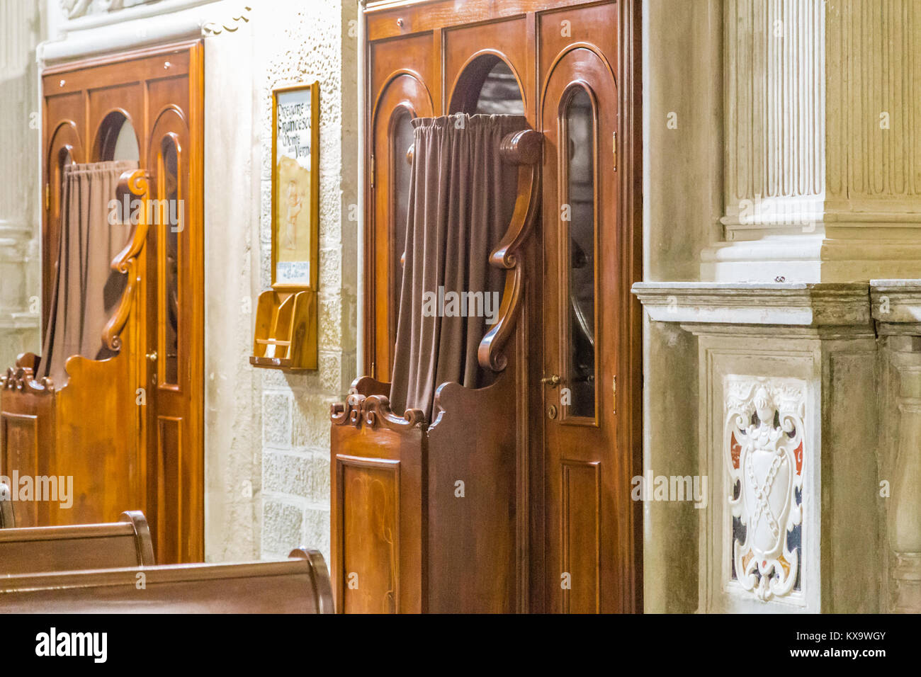 wooden Confessional in Catholic church Stock Photo - Alamy