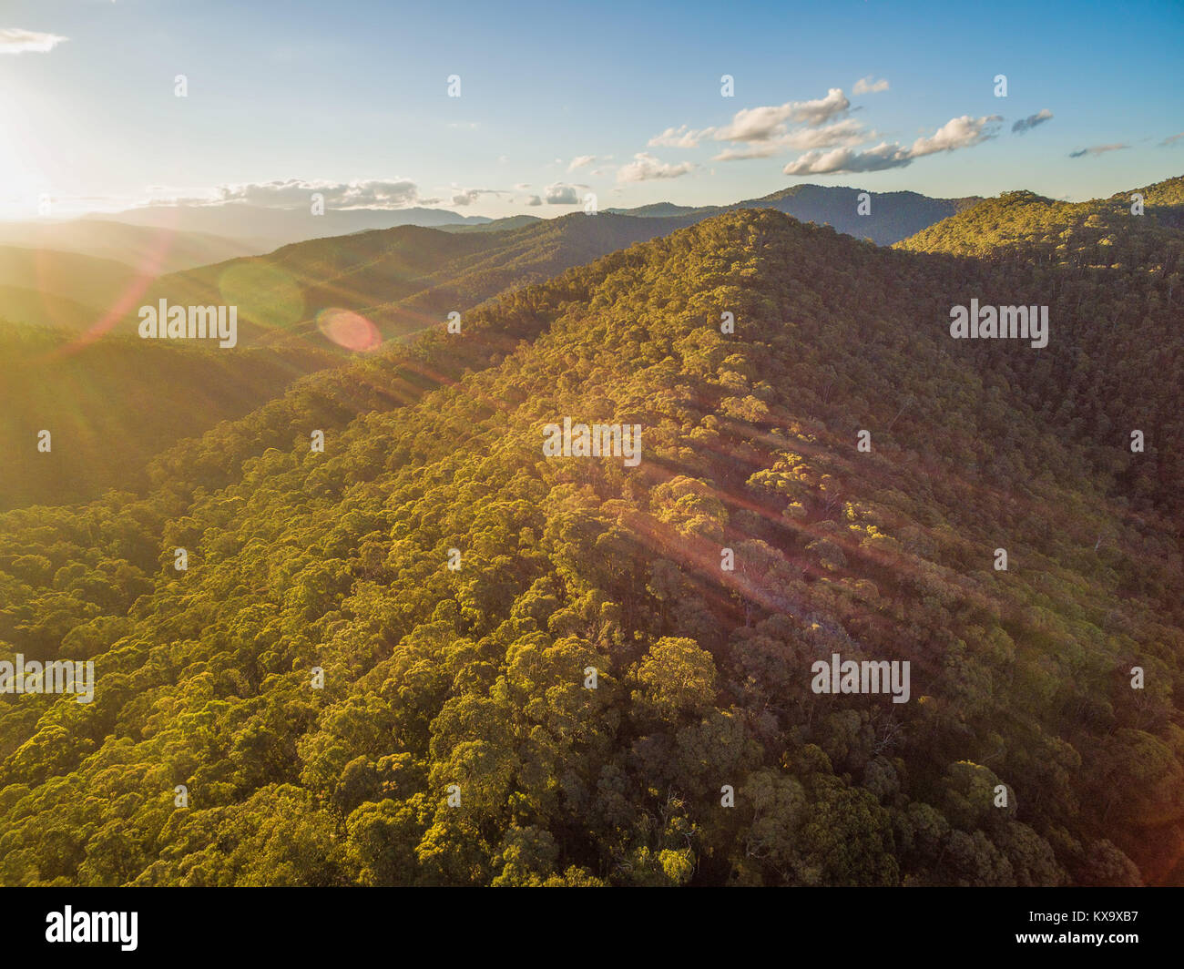 Aerial view of Australian Alps at sunset with sun flare Stock Photo - Alamy