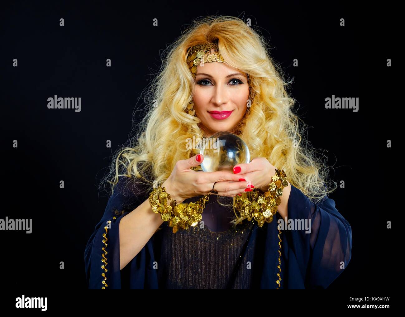 Woman fortune teller with crystal ball portrait Stock Photo - Alamy