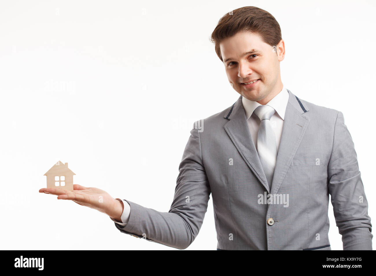 Portrait Young male Estate agent. Mortgage concept Stock Photo - Alamy