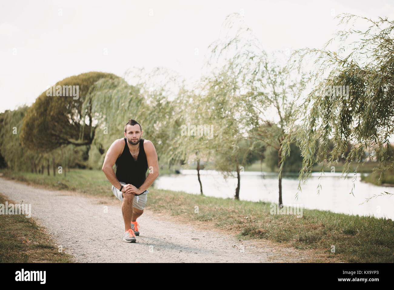 Running in the park. Active sport concept. Healthy sportsman does ...