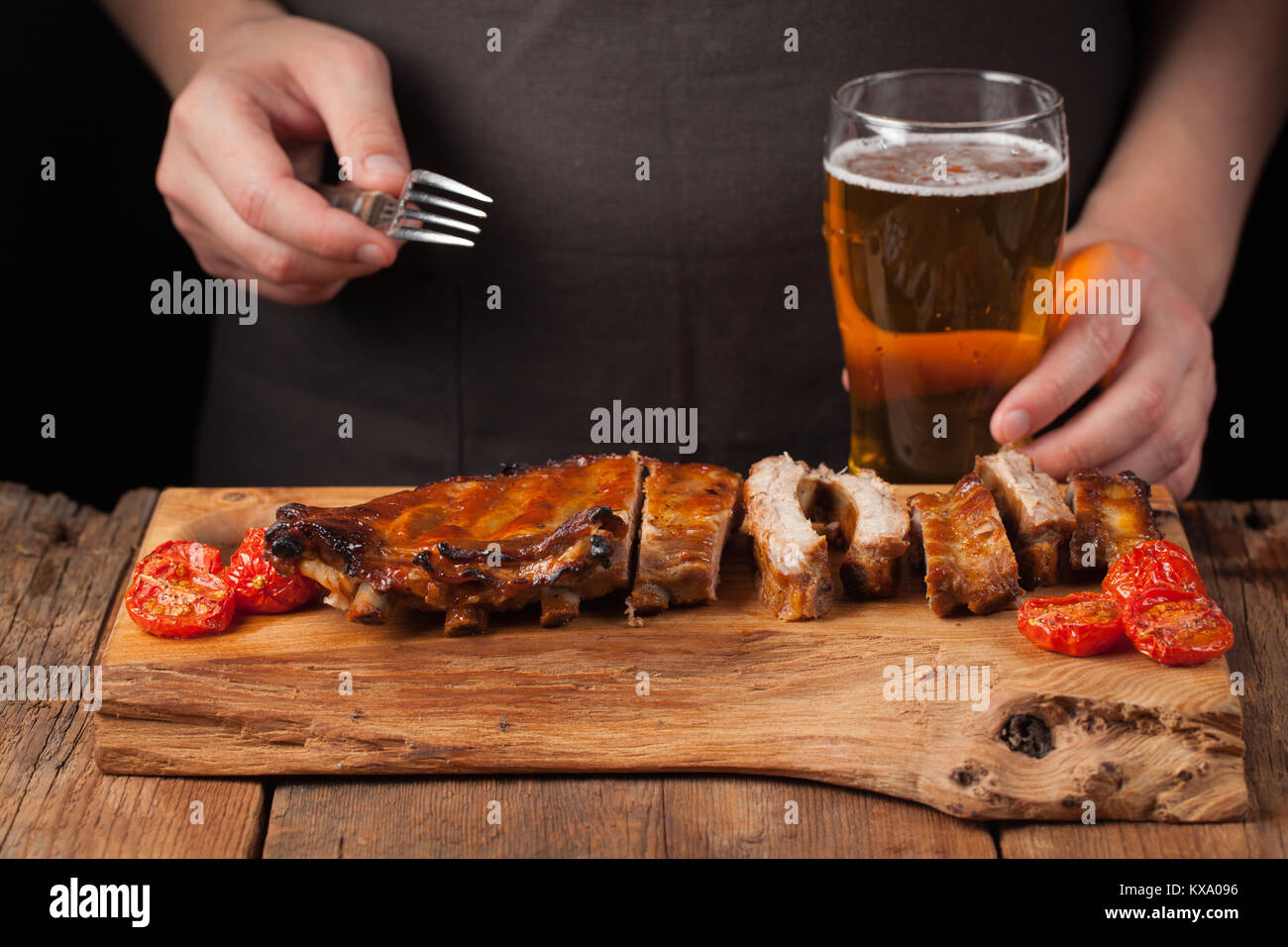 Man eating pork ribs hi-res stock photography and images - Alamy