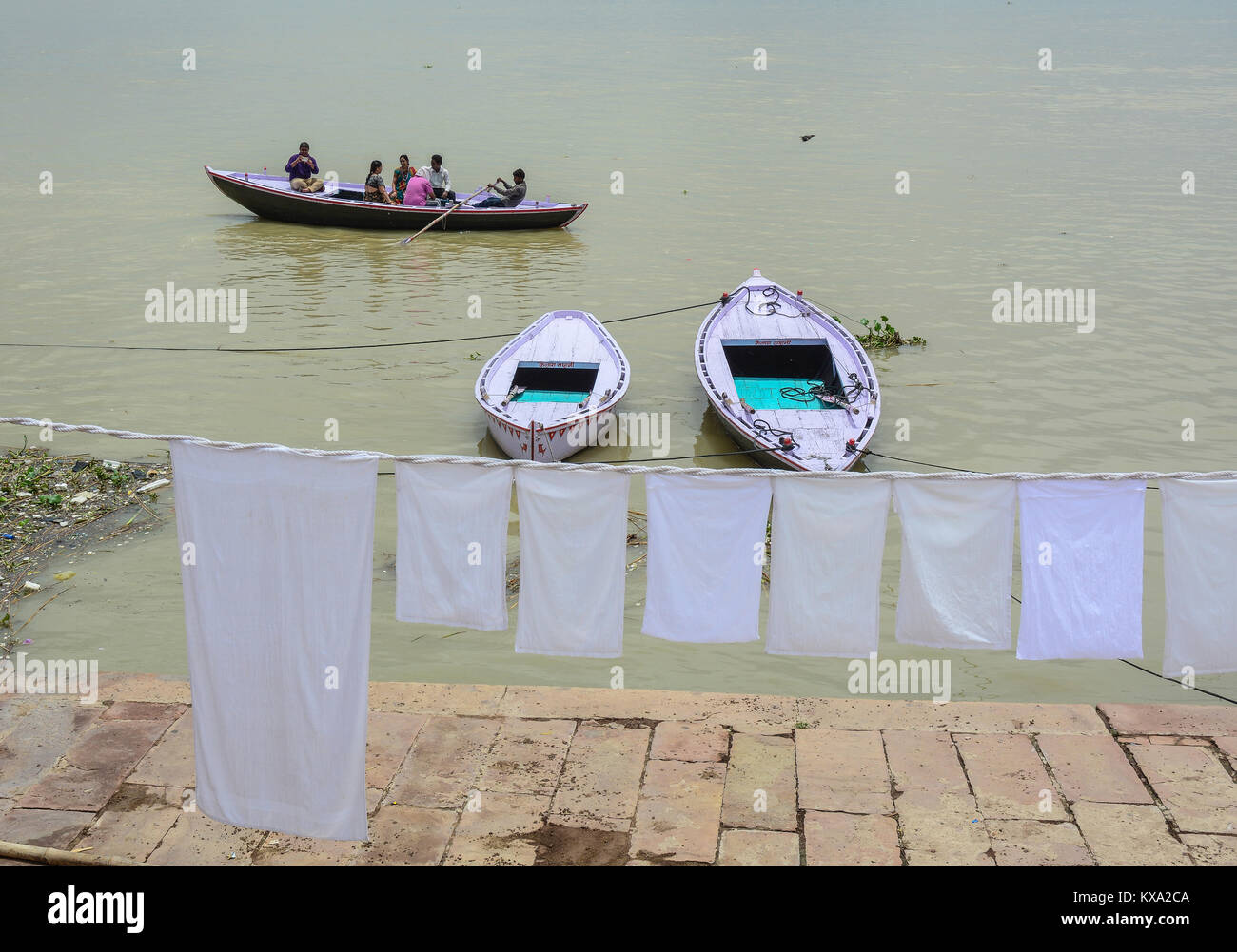 Varanasi, India - Jul 12, 2015. Drying clothes on Ganges riverbank in ...