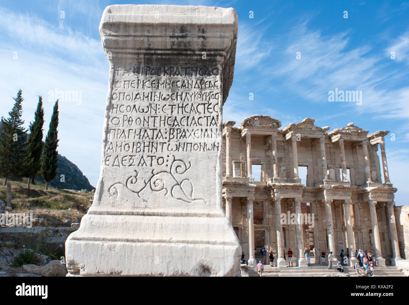 The view of a writing on a column with Celsus Library behind in ancient ...