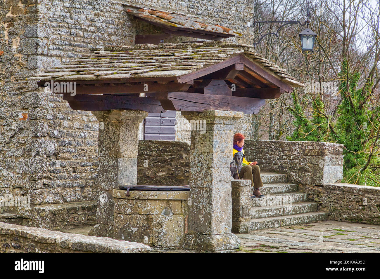 CHIUSI DELLA VERNA, ITALY - JANUARY 4, 2018: Pilgrim sitting on the ...