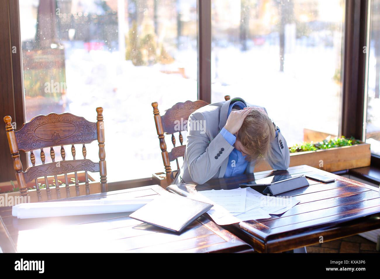 Young student preparing before exam in fast motion at cafe with Stock ...