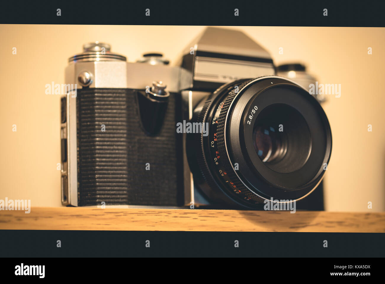 Old fashioned photography camera on wooden shelf, effects applied Stock ...