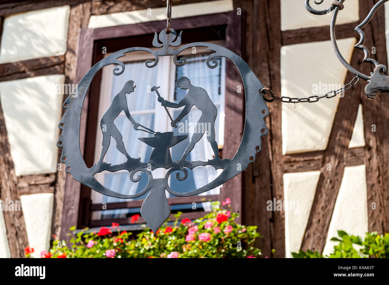 Blacksmiths sign outside old traditional forge in Alsace France Stock ...