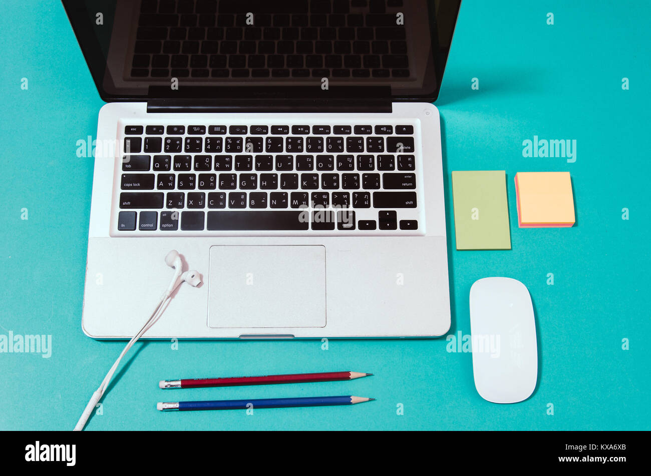 Laptop computer mouse on a green background pencil and pastel Stock ...