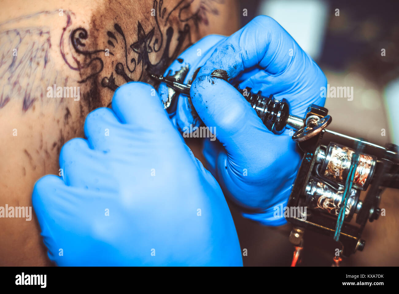 master tattoo woman on her back Stock Photo - Alamy