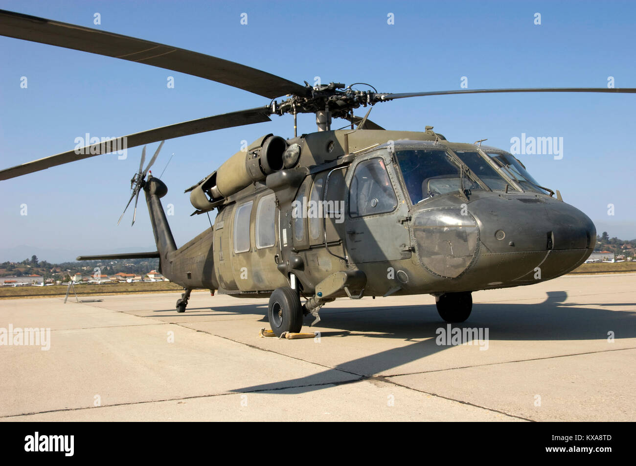 Combat chopper sitting on the tarmac Stock Photo - Alamy