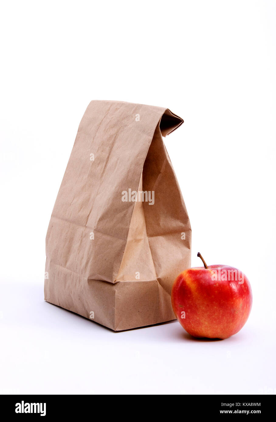 Packed lunch with red apple Stock Photo - Alamy