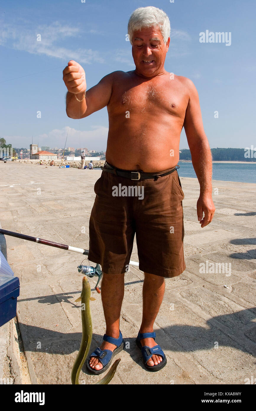 Fishing in a seafront, Porto, Portugal Stock Photo - Alamy