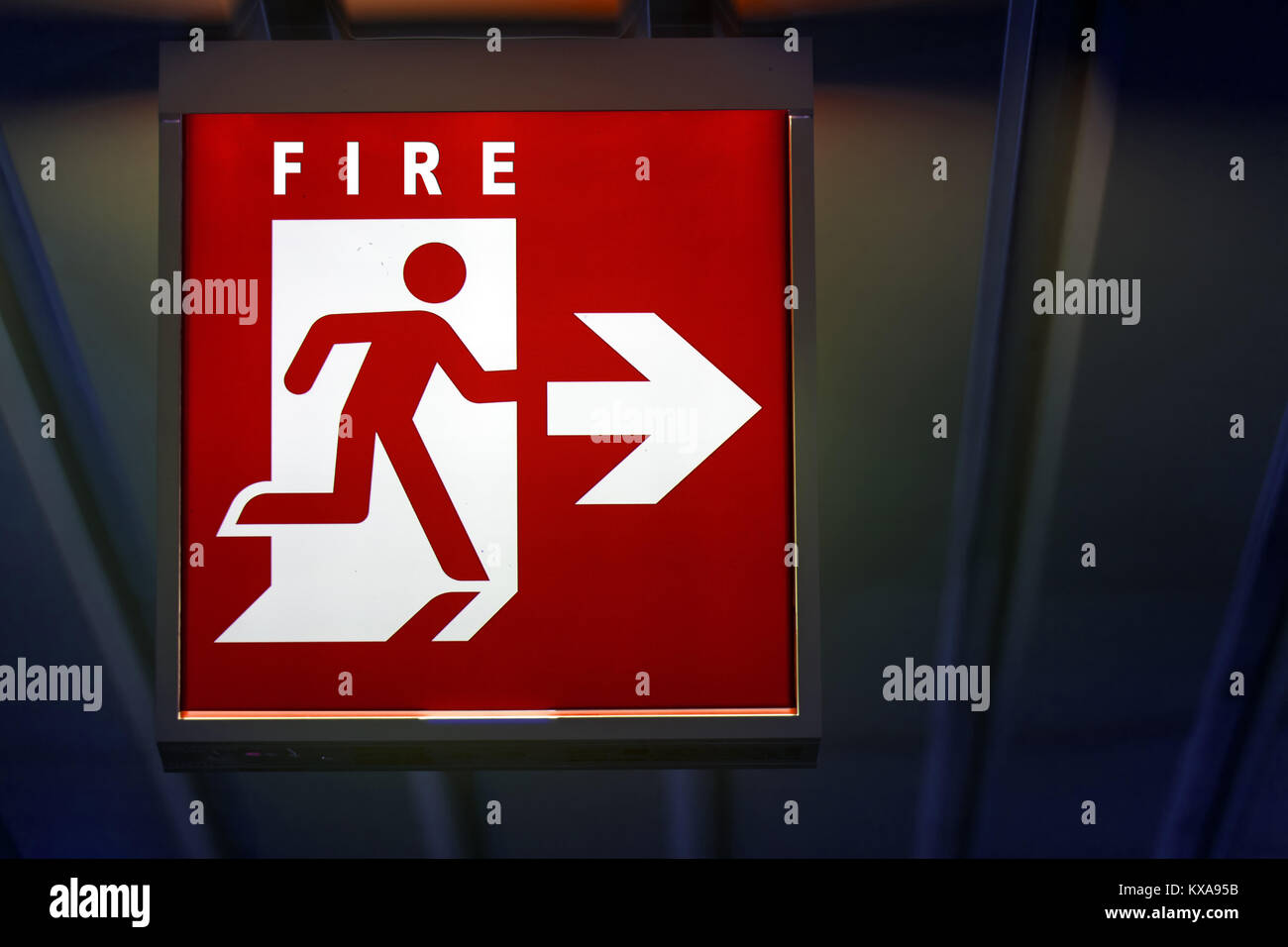 The emergency sign for fire shows the direction of flame. The riskly ...