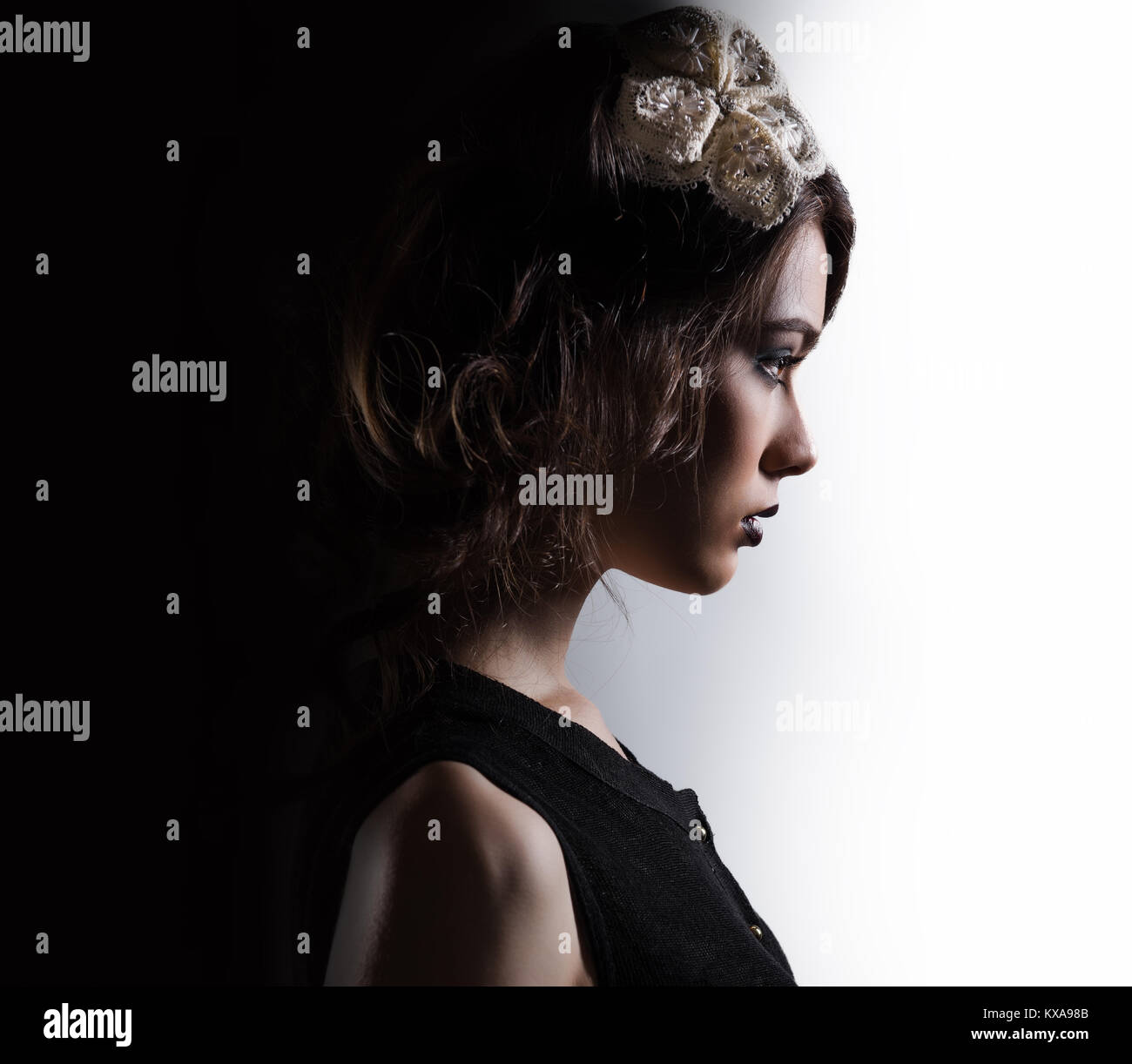 Side-face of gorgeous young woman Stock Photo - Alamy