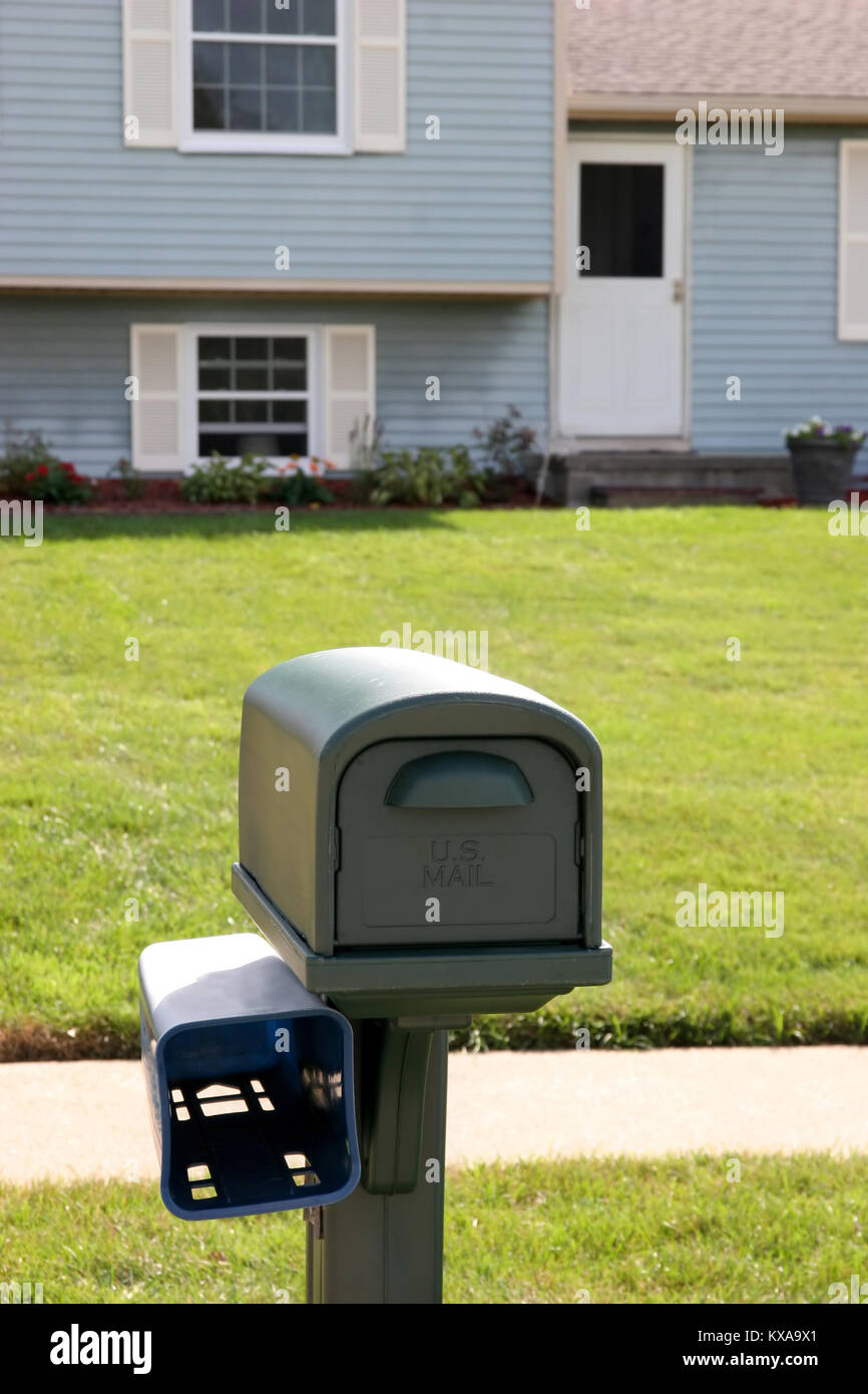 mail box in close up, background house Stock Photo - Alamy