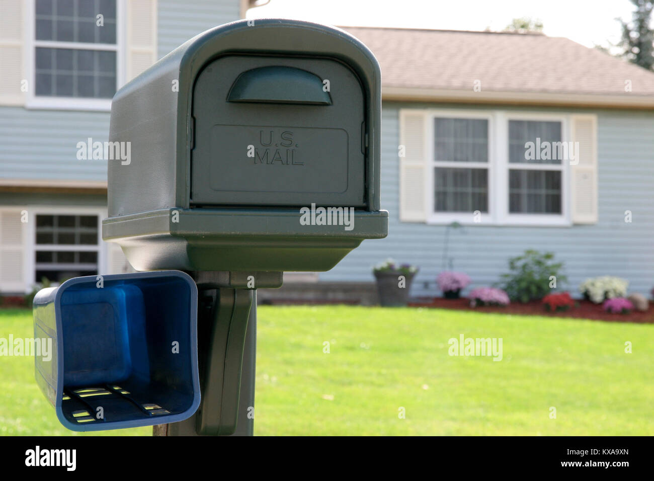mail box in close up, background house Stock Photo - Alamy