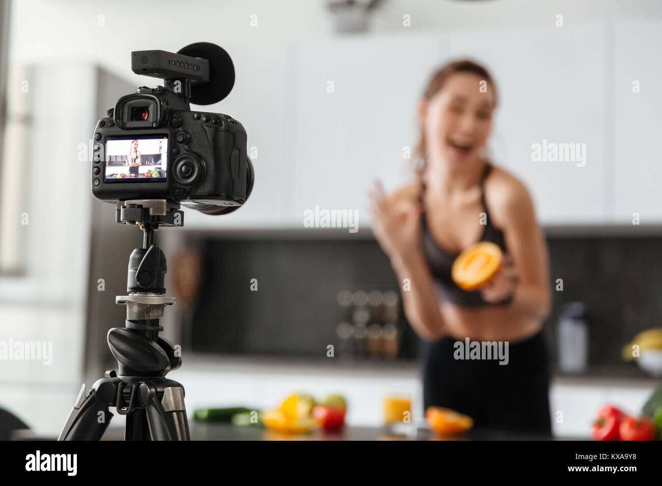 Close up of a camera recording healthy food tutorial indoors in kitchen ...