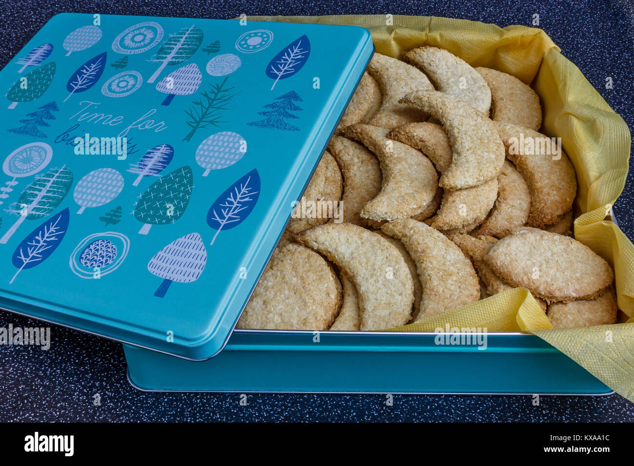 Homemade half-moon shaped cookies in a tin box Stock Photo - Alamy