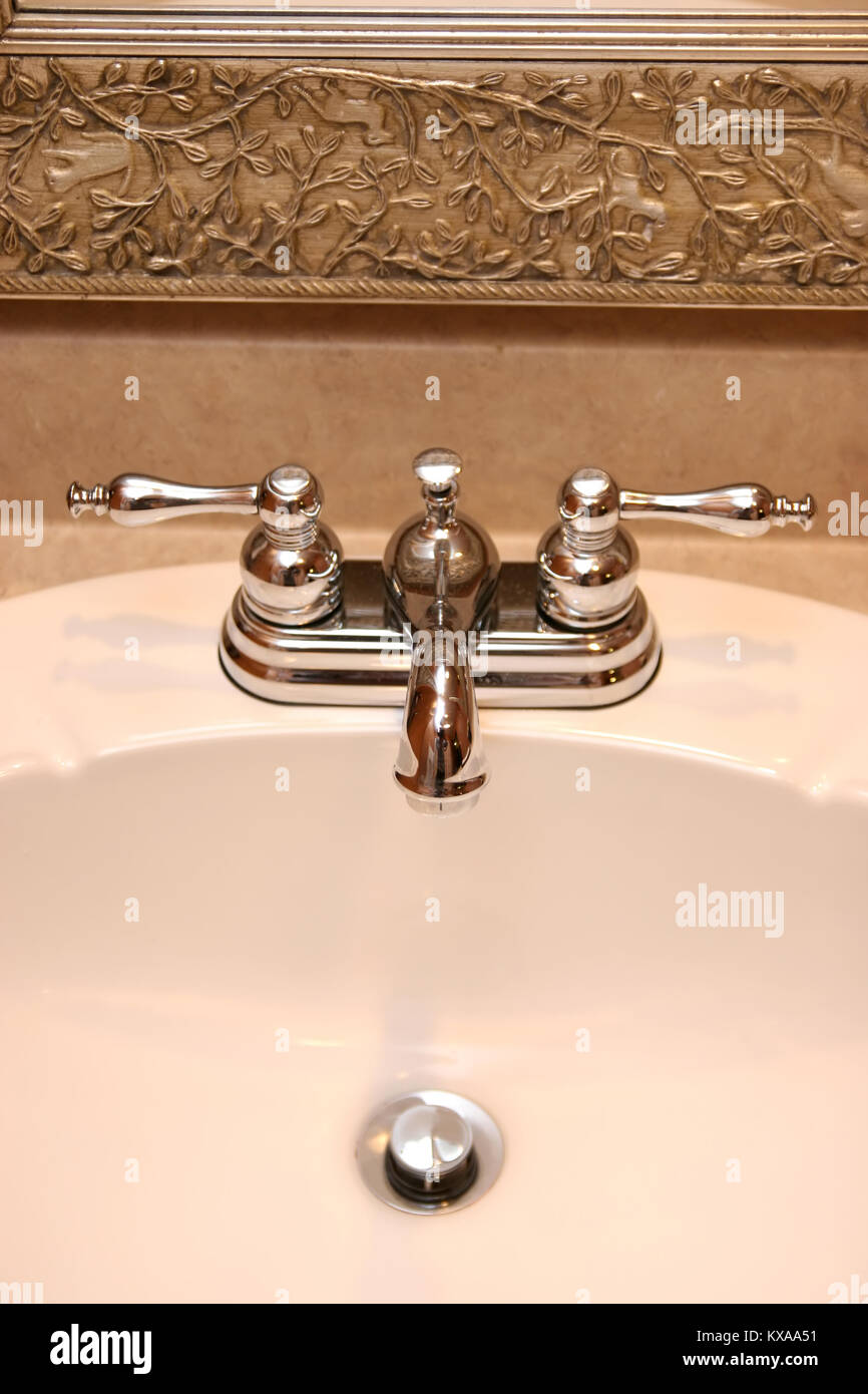 view of a modern bathroom design, faucet Stock Photo - Alamy