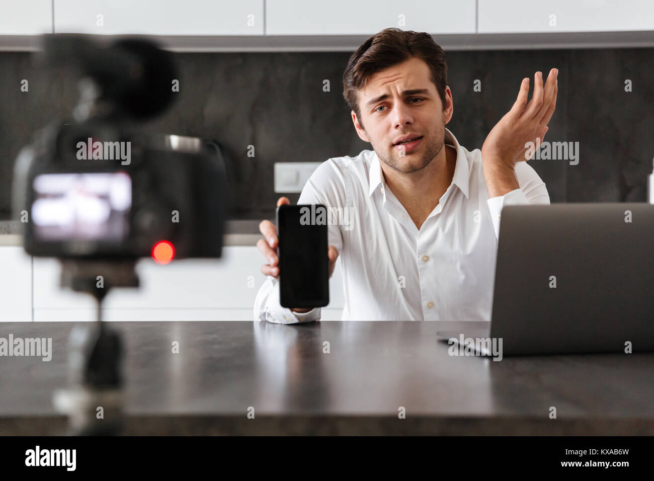 Man filming video with mobile phone hi-res stock photography and images ...